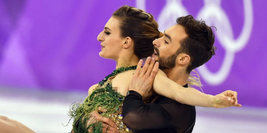 RampantTV - Olympic figure skater's boob falls out during performance